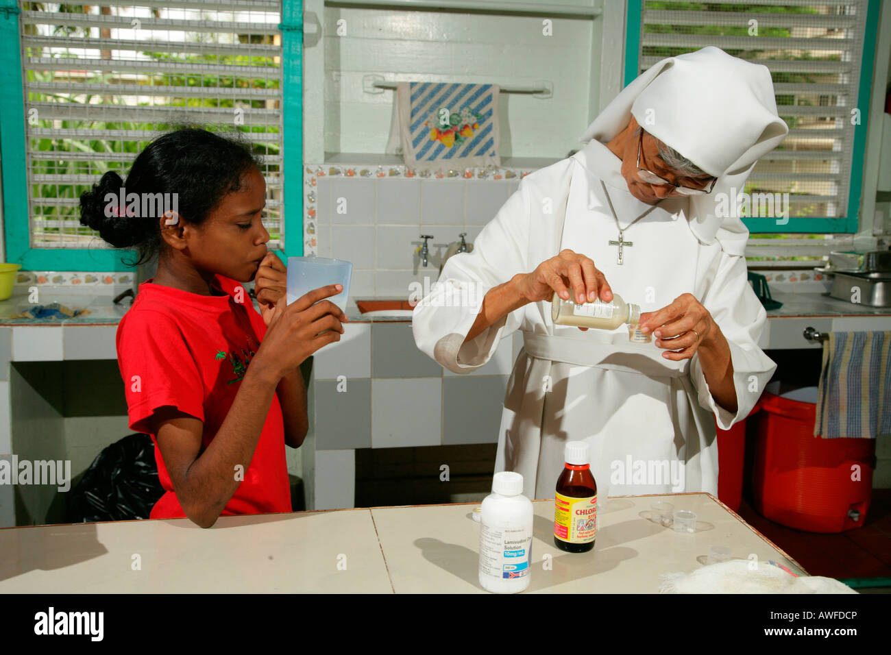 Nun administering medication, everyday life at an Ursuline convent and ...