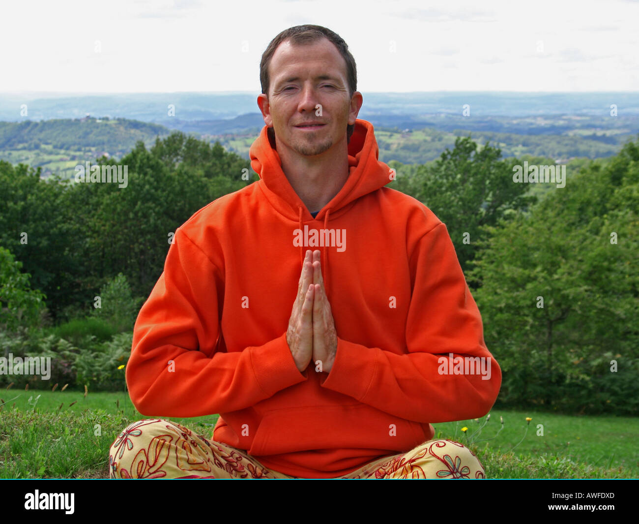 smile meditating man Stock Photo - Alamy