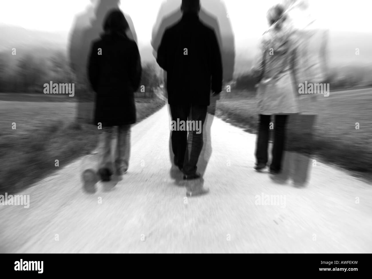 Three figures walk hi-res stock photography and images - Alamy