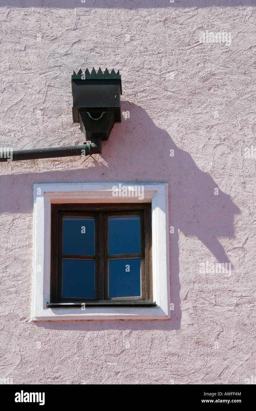 Window and eaves trough on a building facade in Muehldorf am Inn, Upper ...