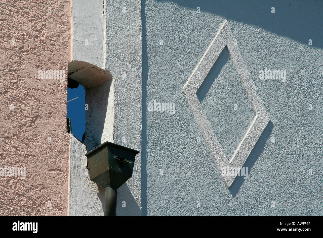 Window and eaves trough on a building facade in Muehldorf am Inn, Upper ...