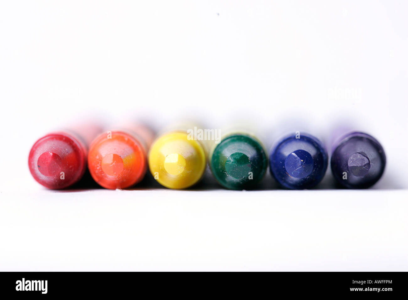 A line of six crayons Stock Photo - Alamy