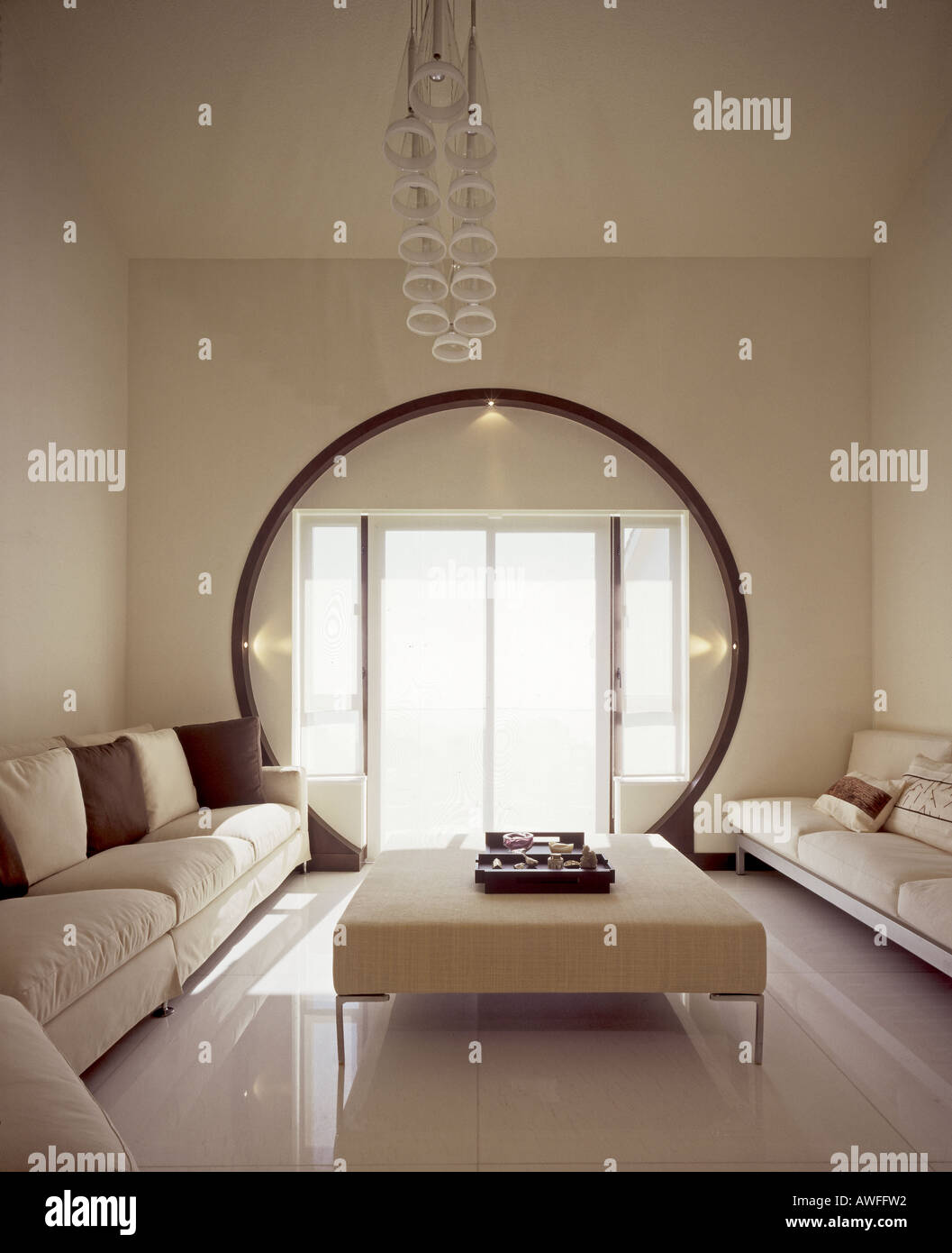 Living area with moongate window Stock Photo - Alamy