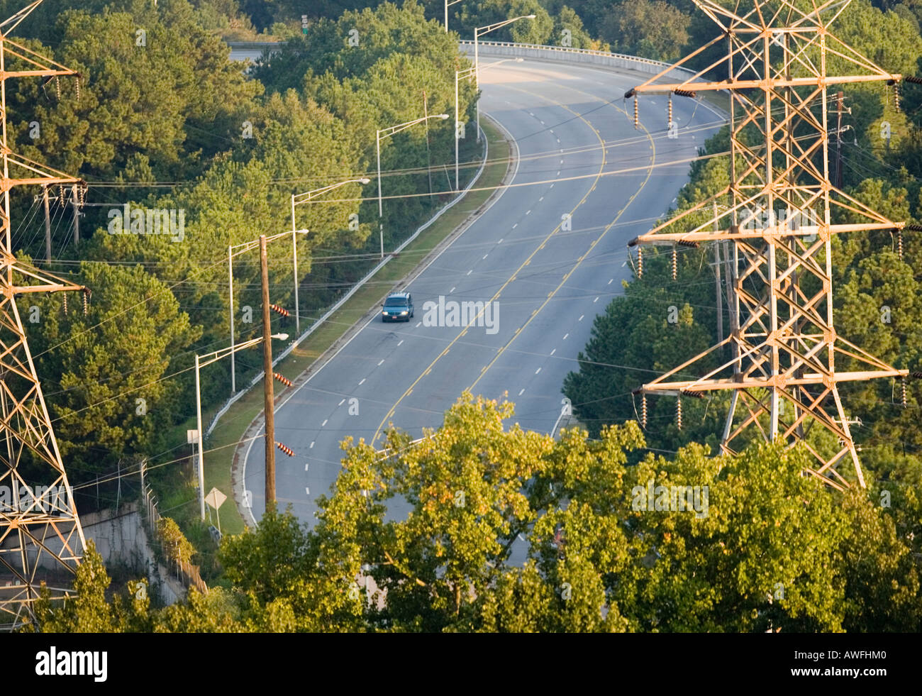Car traveling on a curved road Stock Photo - Alamy
