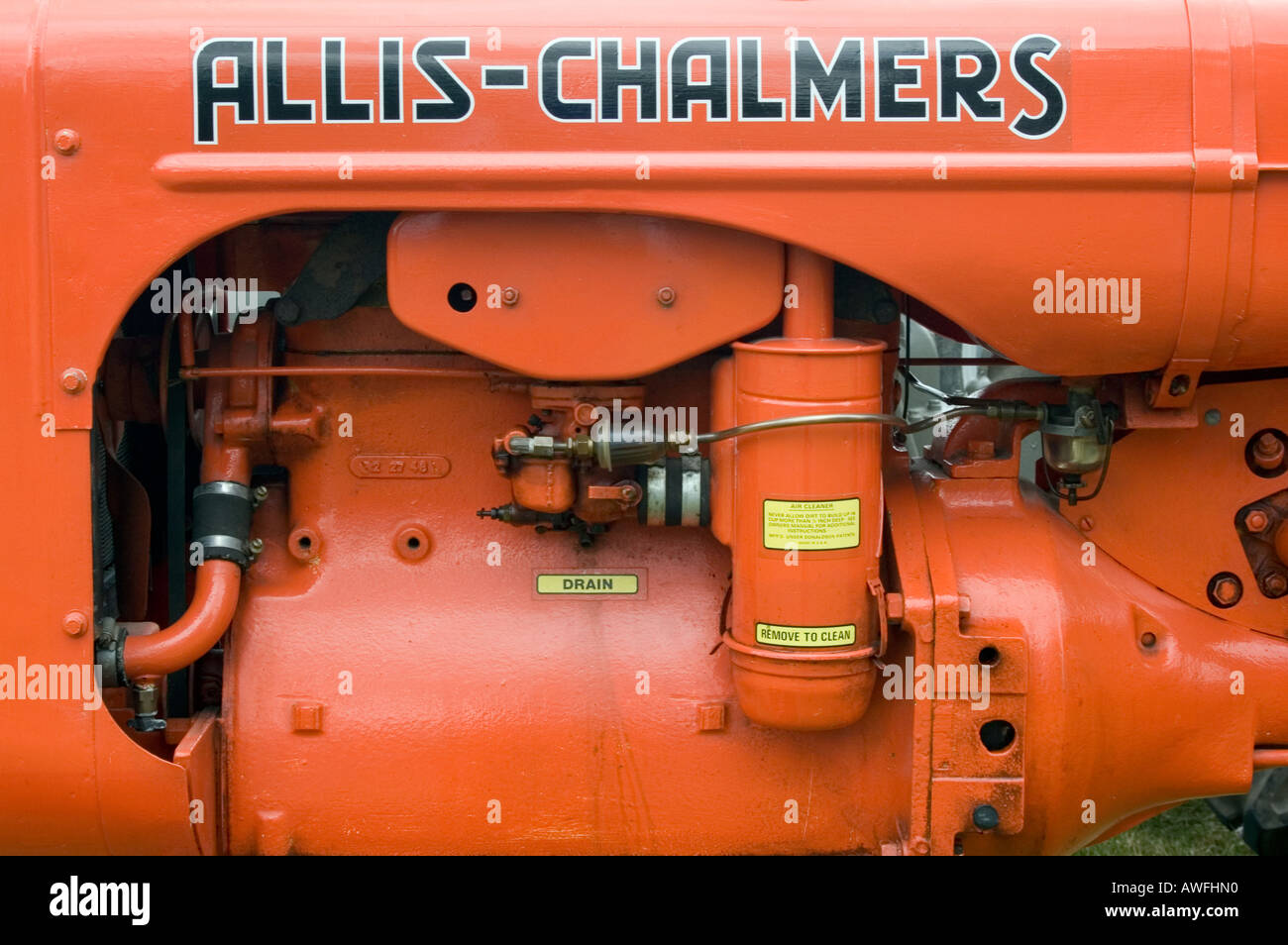 Allis Chalmers Tractor engine in orange Stock Photo - Alamy