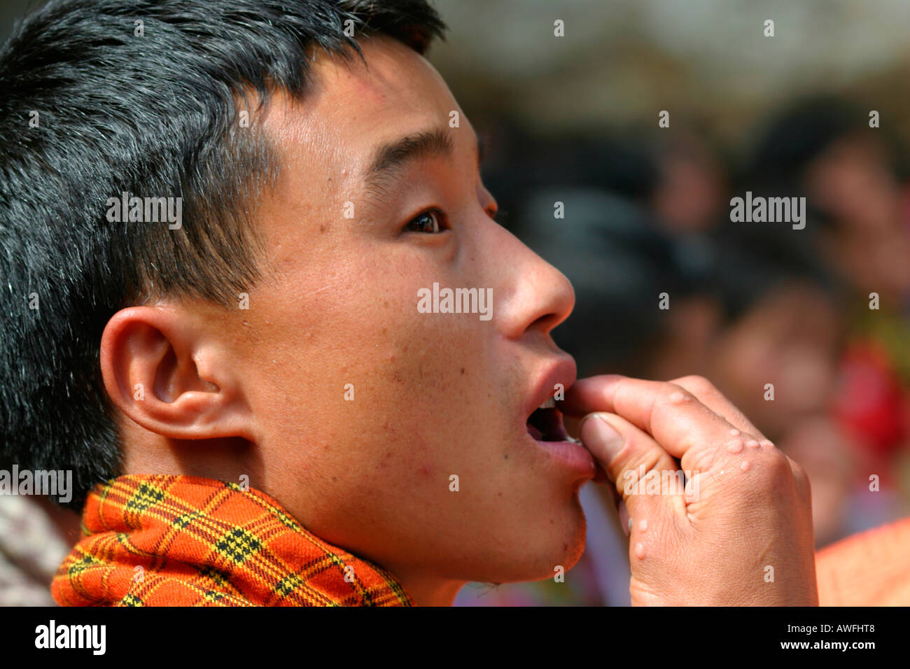 Portrait of a bhutanese man eating, Bhutan Stock Photo - Alamy
