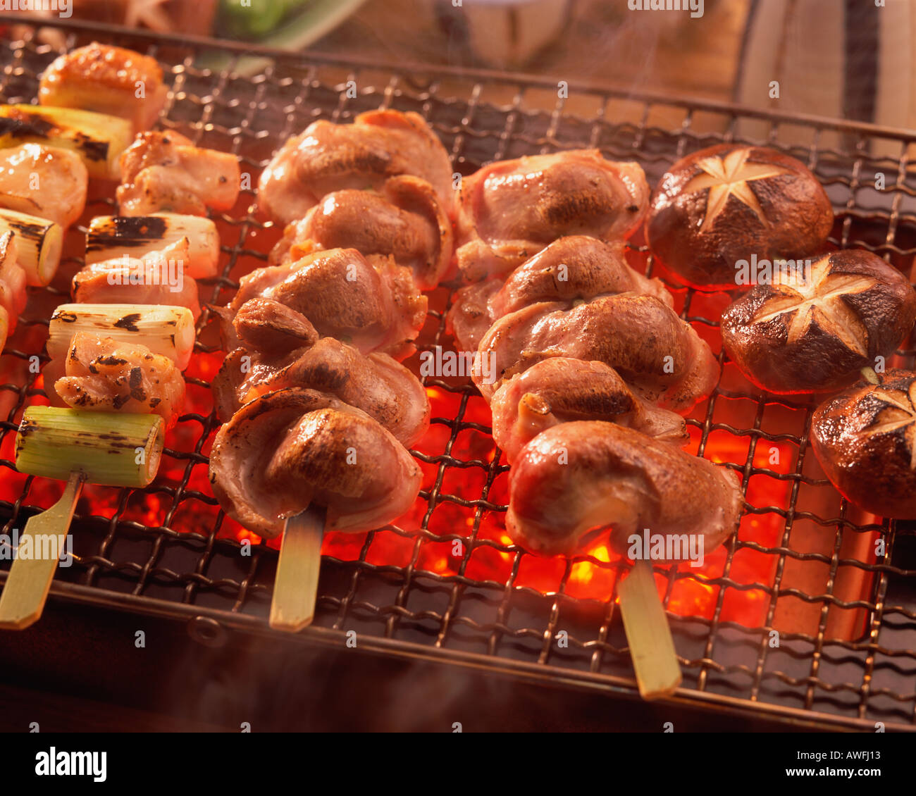 Grilled chicken gizzard over charcoal Stock Photo - Alamy