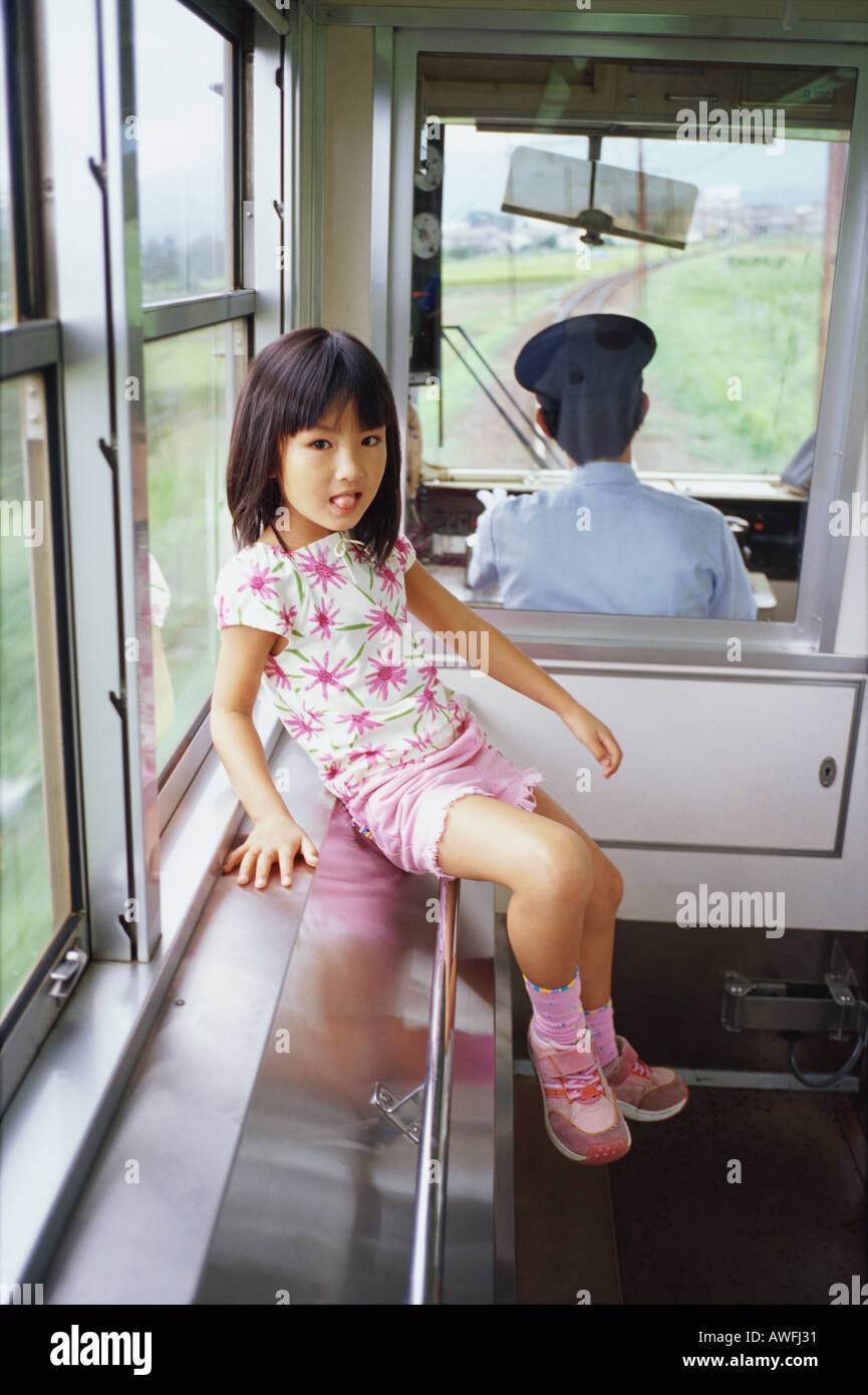 Girl on train Stock Photo - Alamy