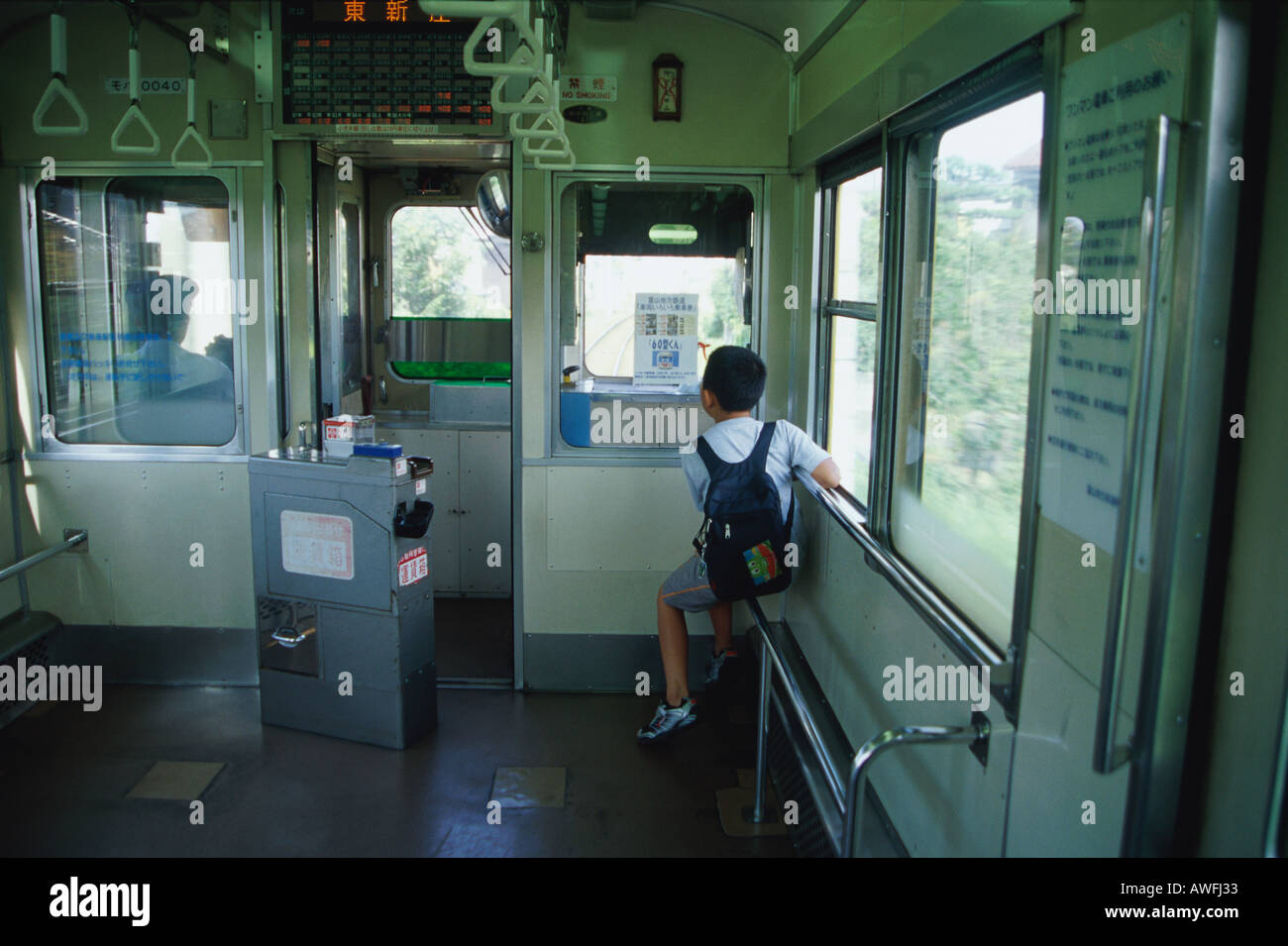 Boy on train Stock Photo - Alamy