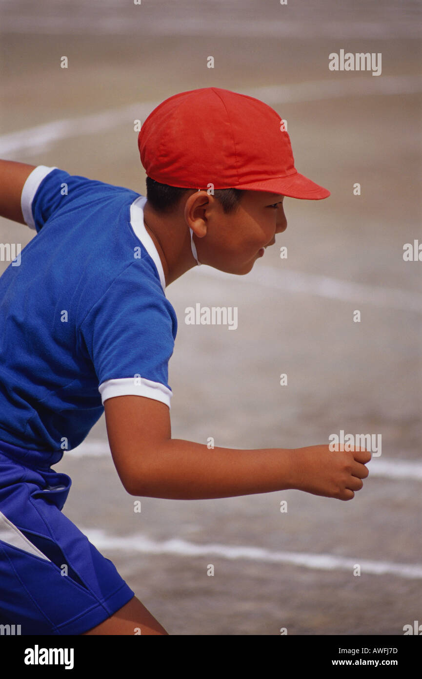 Boy in starting position at school sports day Stock Photo - Alamy