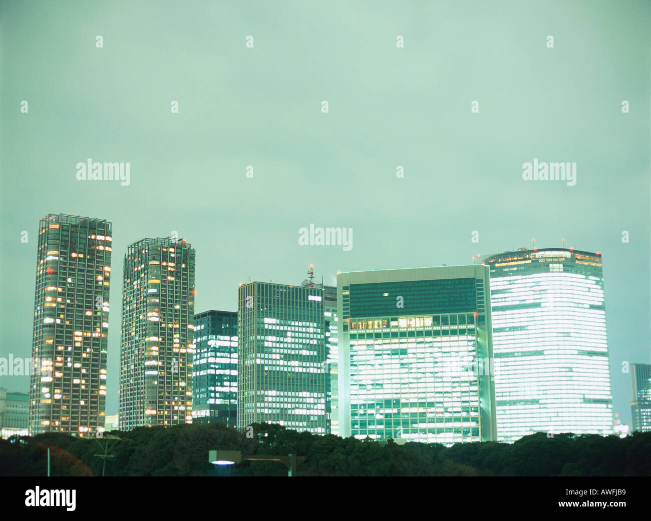 Illuminated office buildings in Shiodome Tokyo Stock Photo - Alamy