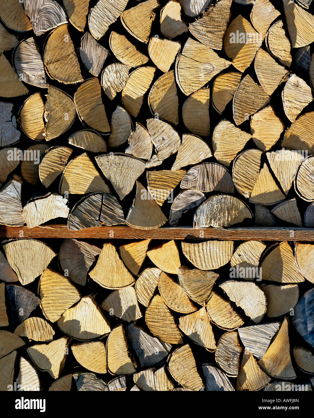 Stack of firewood Stock Photo - Alamy
