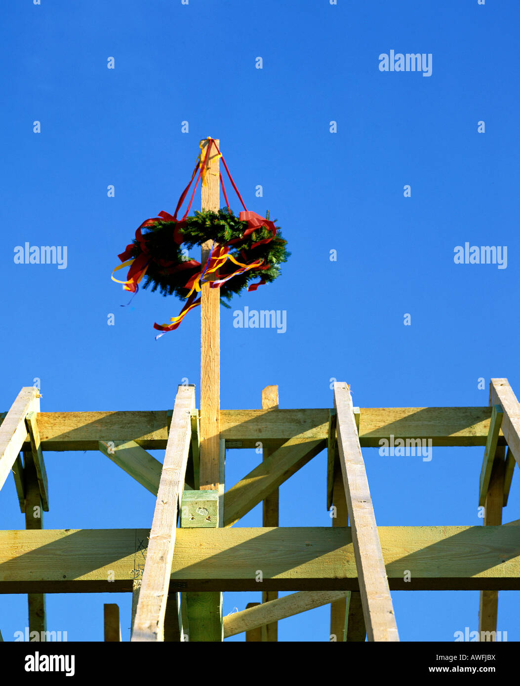 Topping out ceremony, rooftop rafters Stock Photo - Alamy