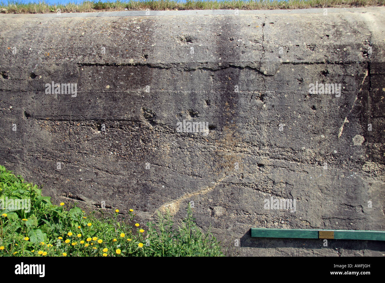 Bullet damage to one of the concrete casements at the German Merville ...