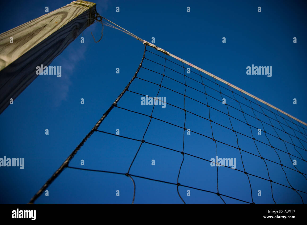 Volleyball net against a blue sky Stock Photo - Alamy