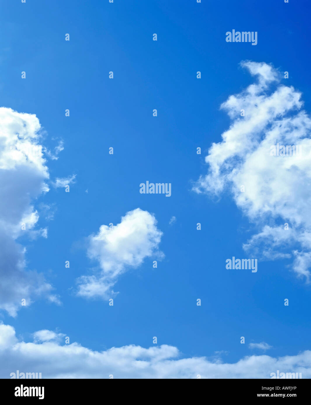 Cumulus clouds in a blue sky Stock Photo - Alamy