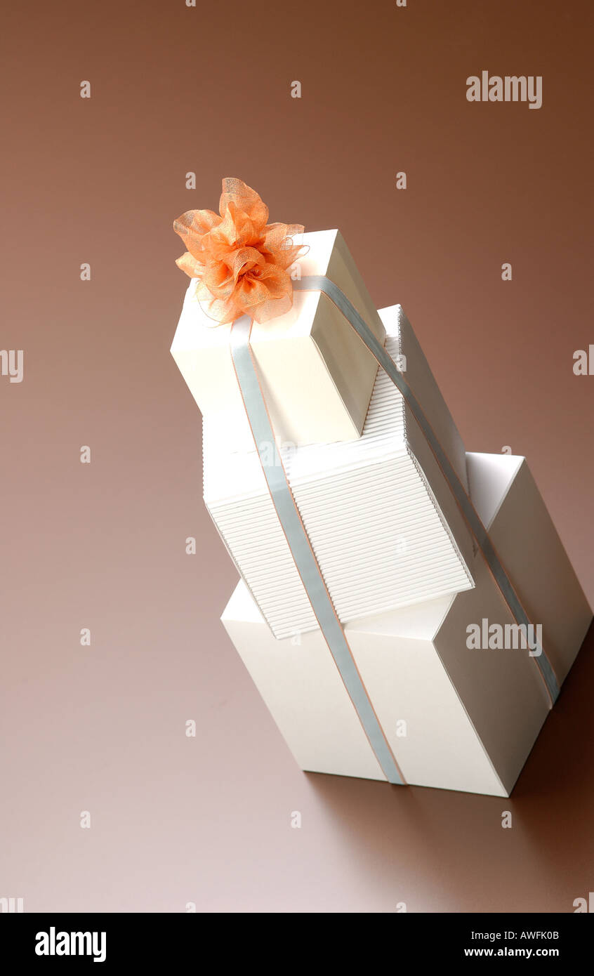 Three gift boxes with ribbon Stock Photo - Alamy