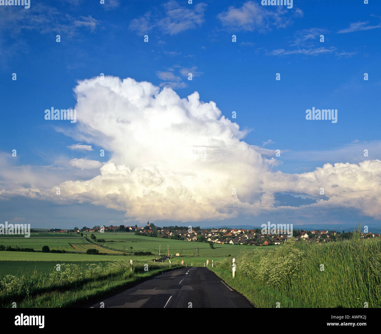 Cumulonimbus thunderheads in a blue sky, approaching thunderstorm in ...