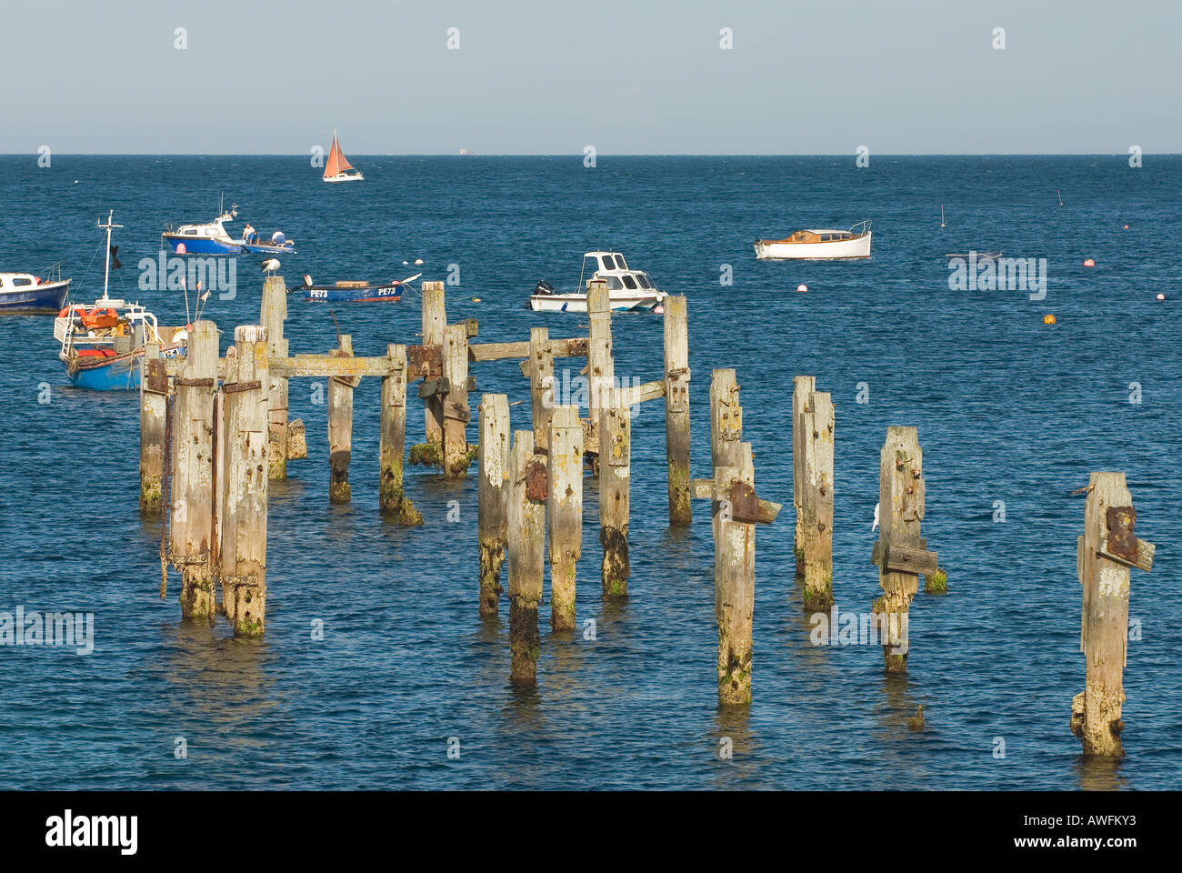 Swanage Harbour showing the old pier Stock Photo - Alamy