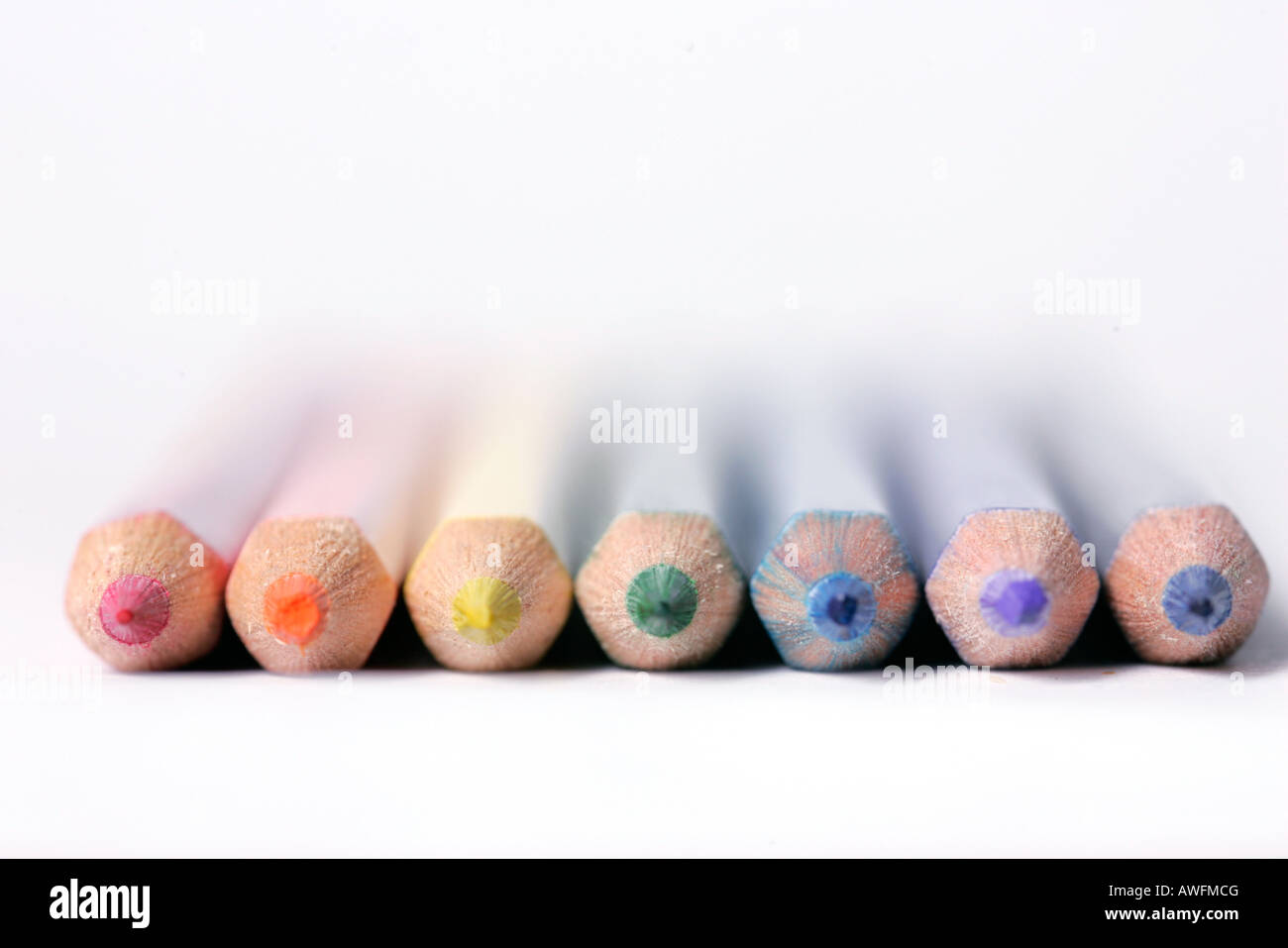 Seven pencil crayons arranged in a row Stock Photo - Alamy