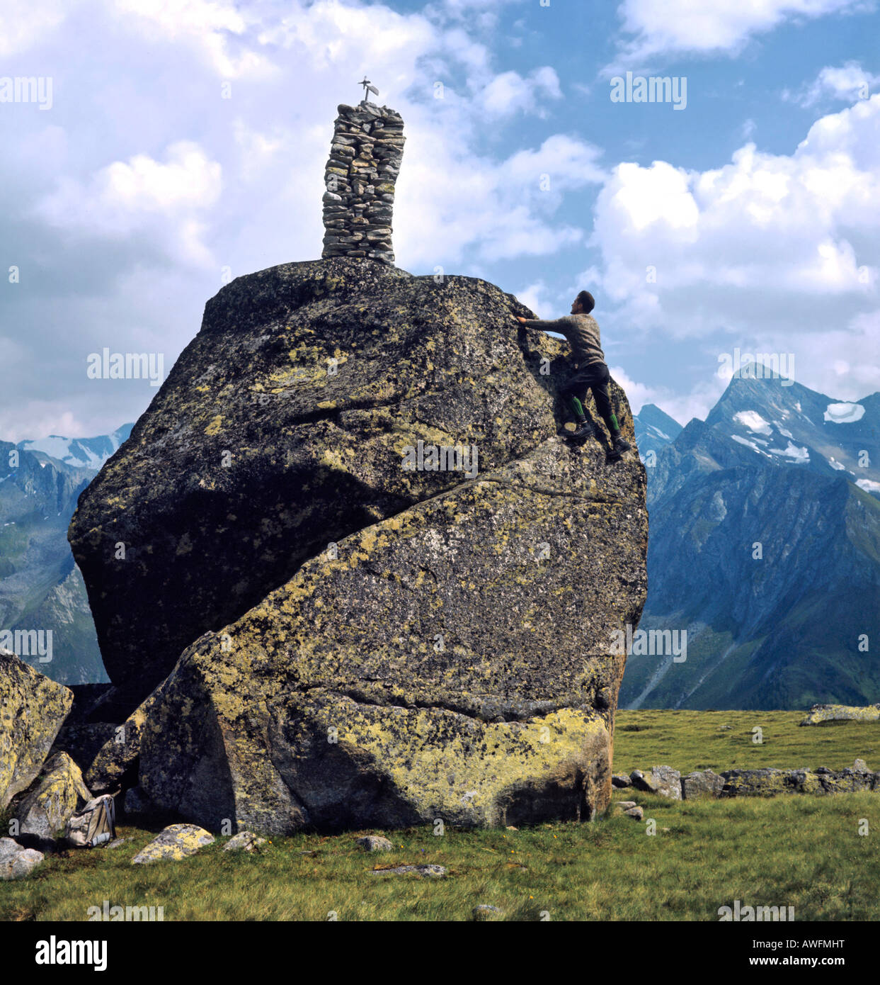 Stone figure (cairn) on top of a boulder, Ahrntal Valley, Dolomites ...