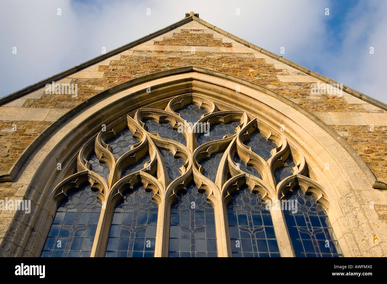 Angled view looking up at a church window Stock Photo - Alamy