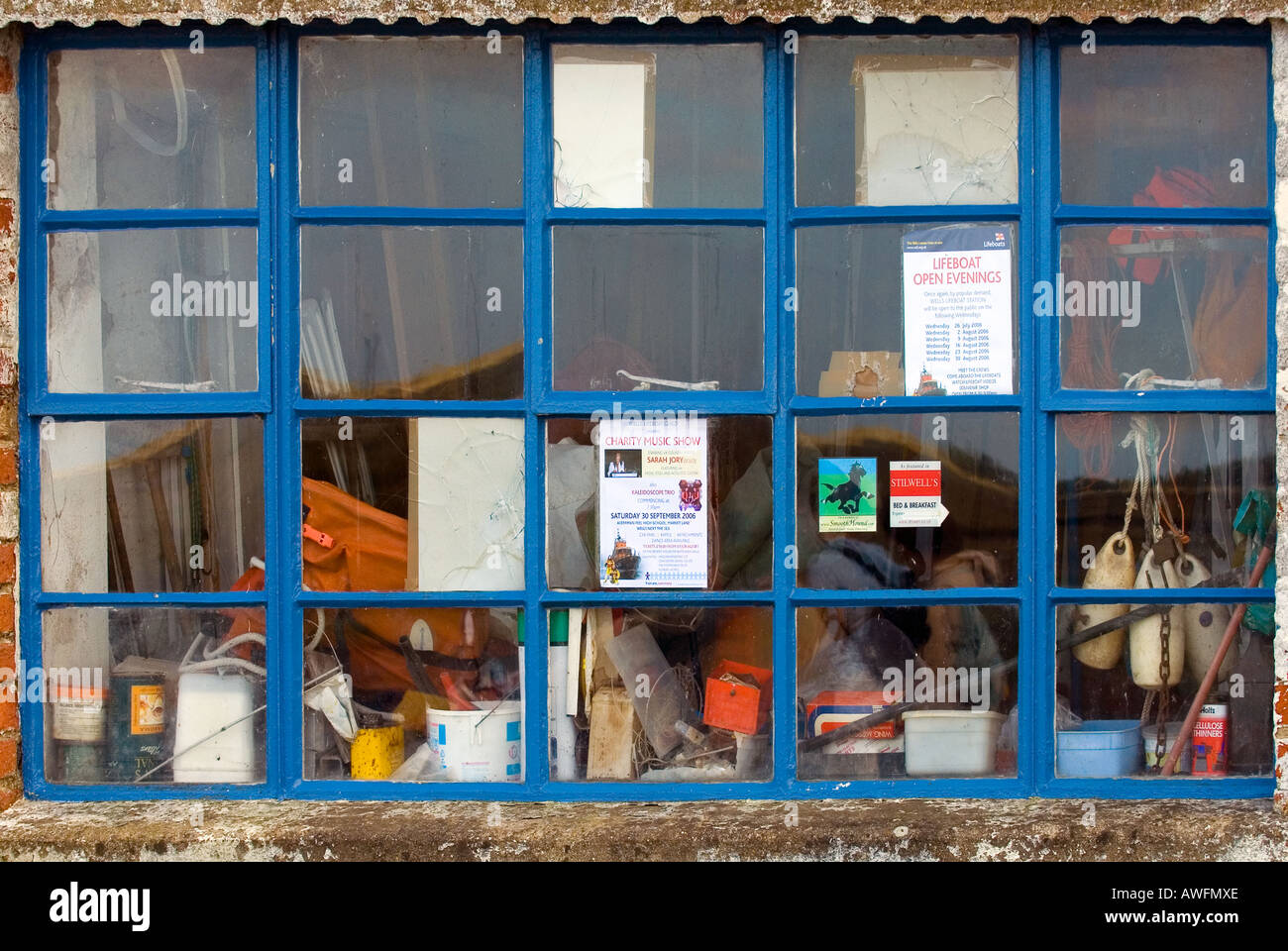 Old workshop window showing tools inside Stock Photo - Alamy