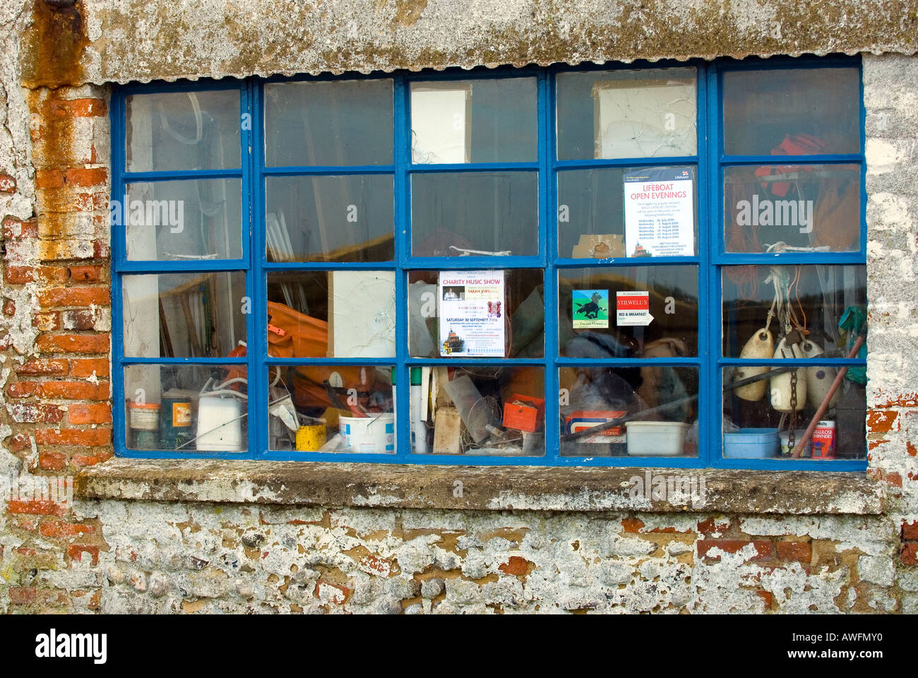 Old workshop window showing tools inside Stock Photo - Alamy