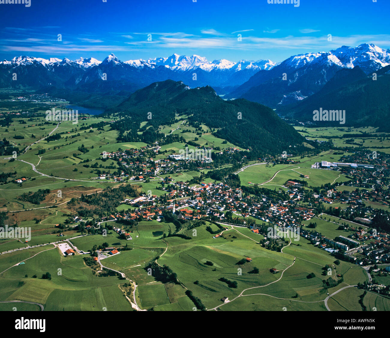 Aerial shot of the town of Pfronten, Falkenstein Castle, the ...