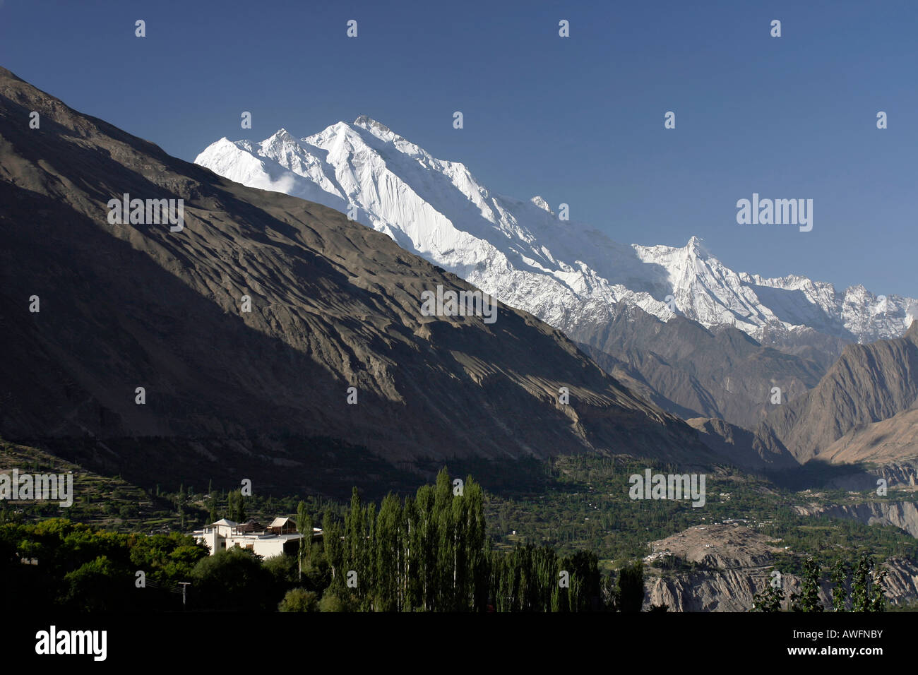 rakaposhi towers above karimabad hunza pakistan Stock Photo - Alamy