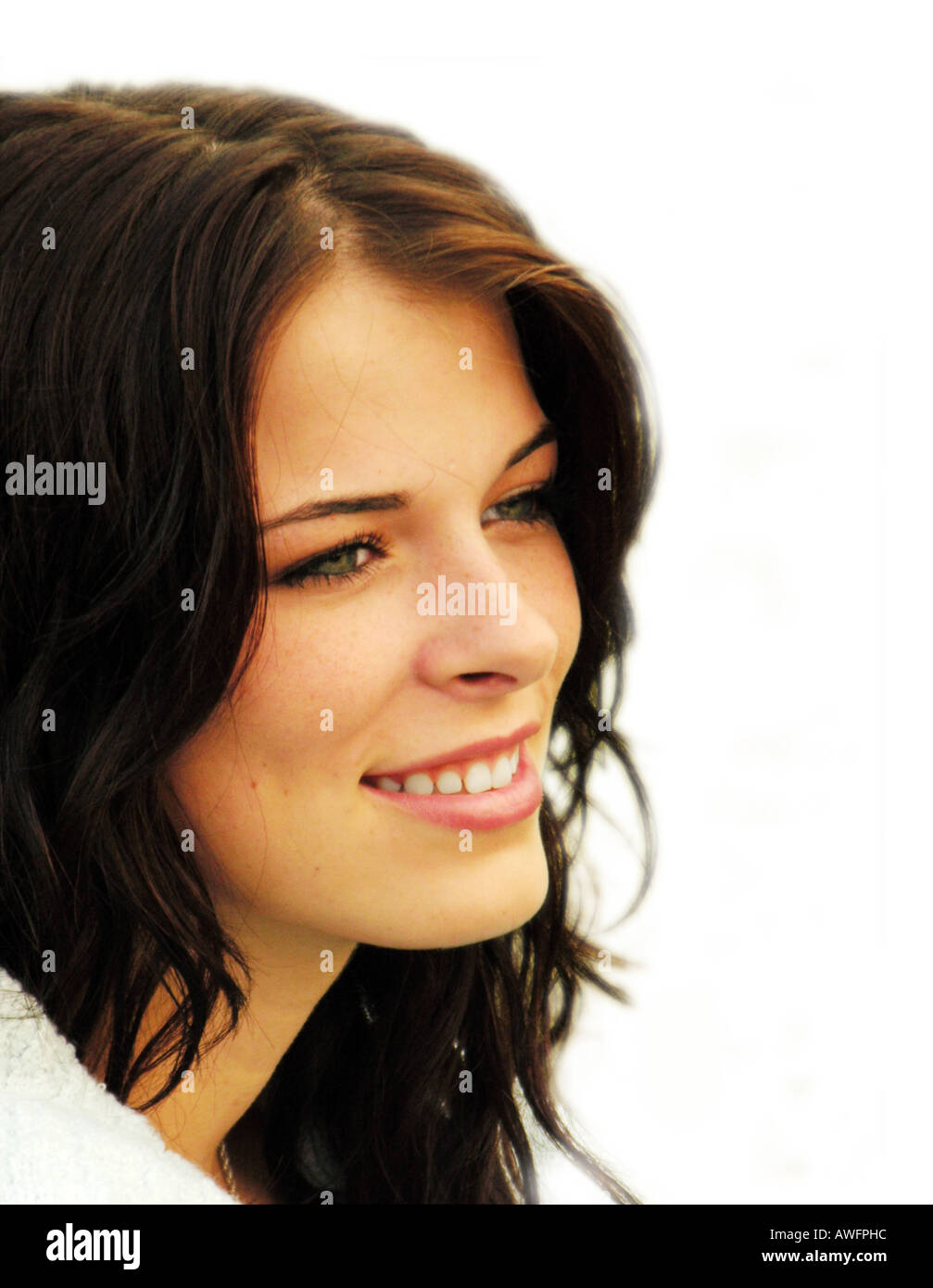 Side view of beautiful teenage girl on white background Stock Photo - Alamy