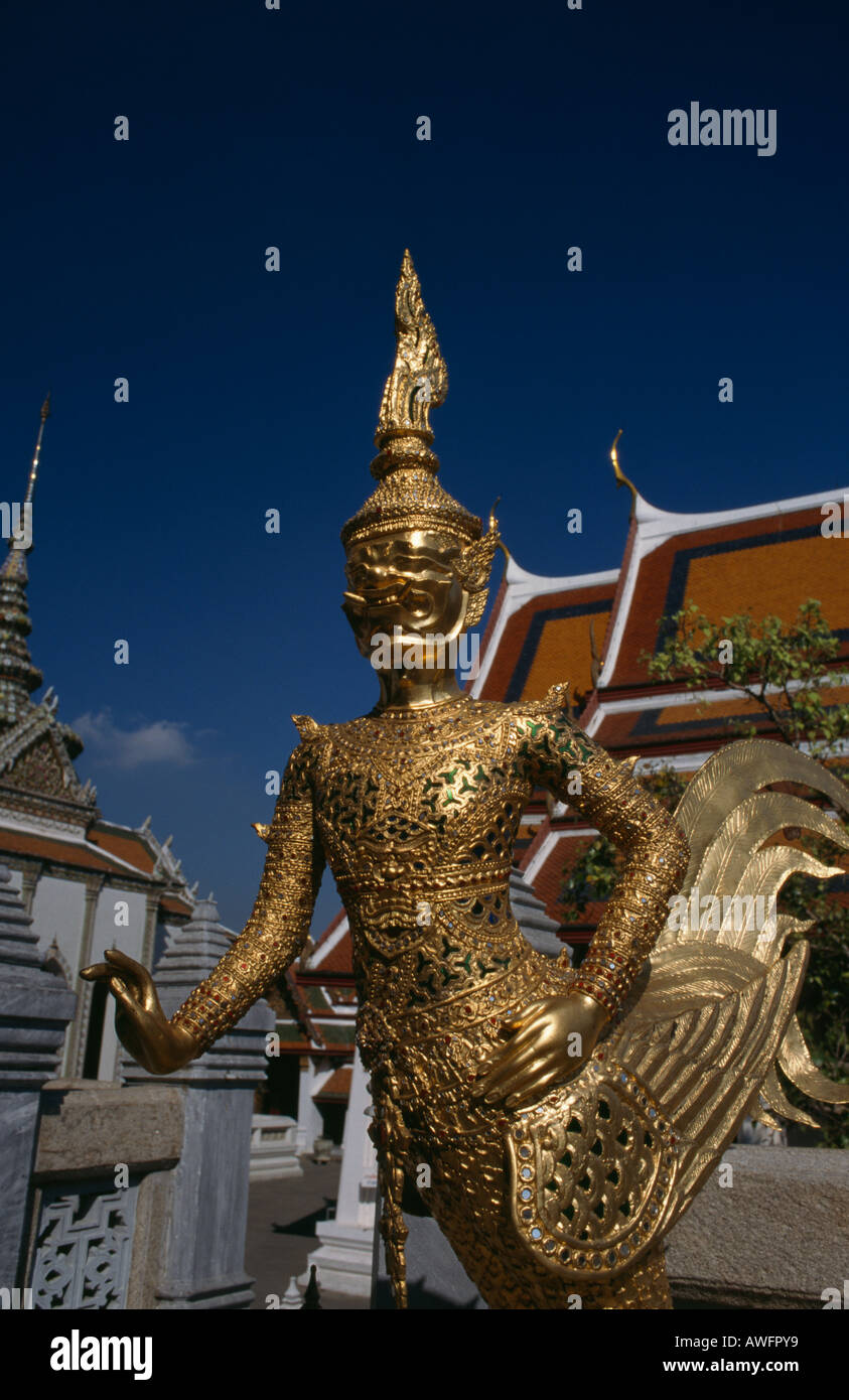 Golden statue by the Royal Pantheon in the Grand Palace complex ...