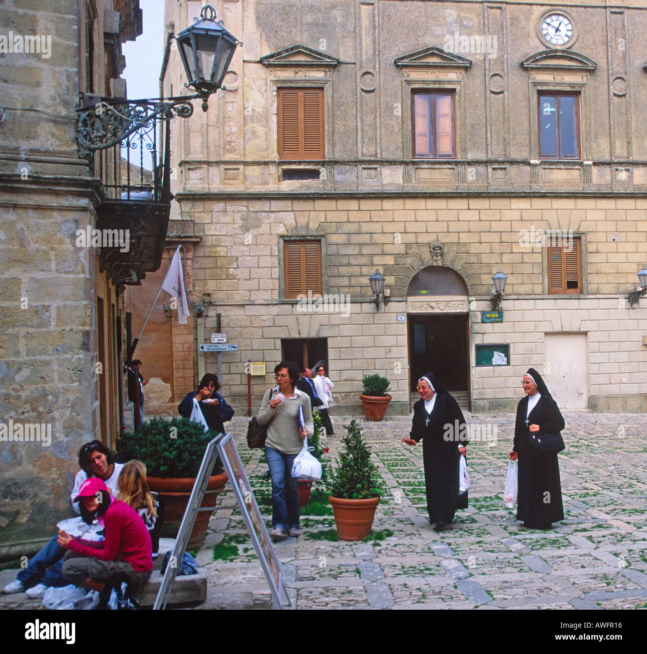 Two roman catholic nuns in the main square Erice Sicily Italy Stock ...