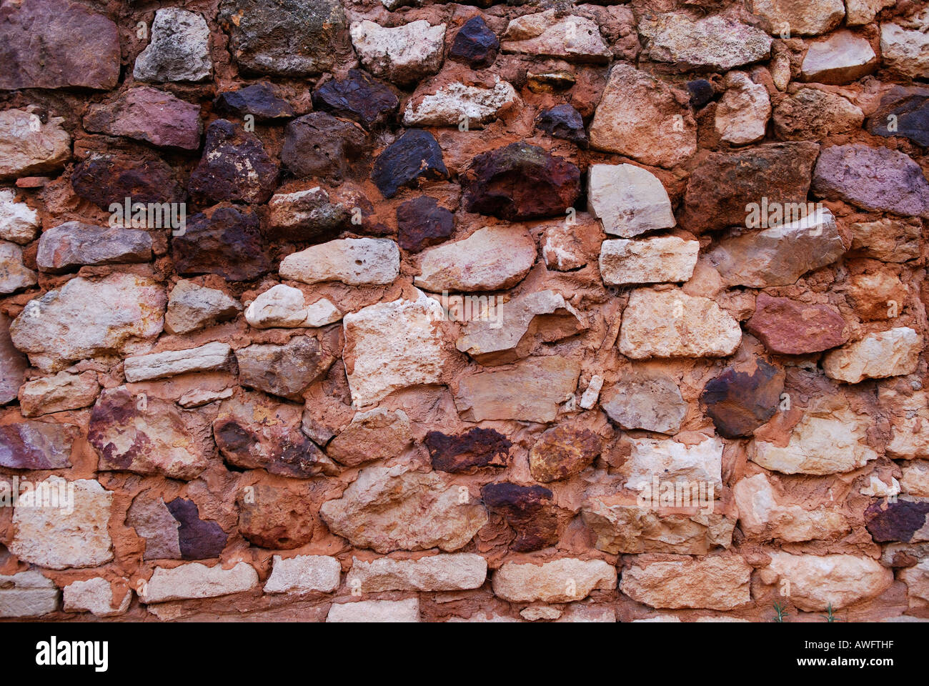 Red stone wall hi-res stock photography and images - Alamy