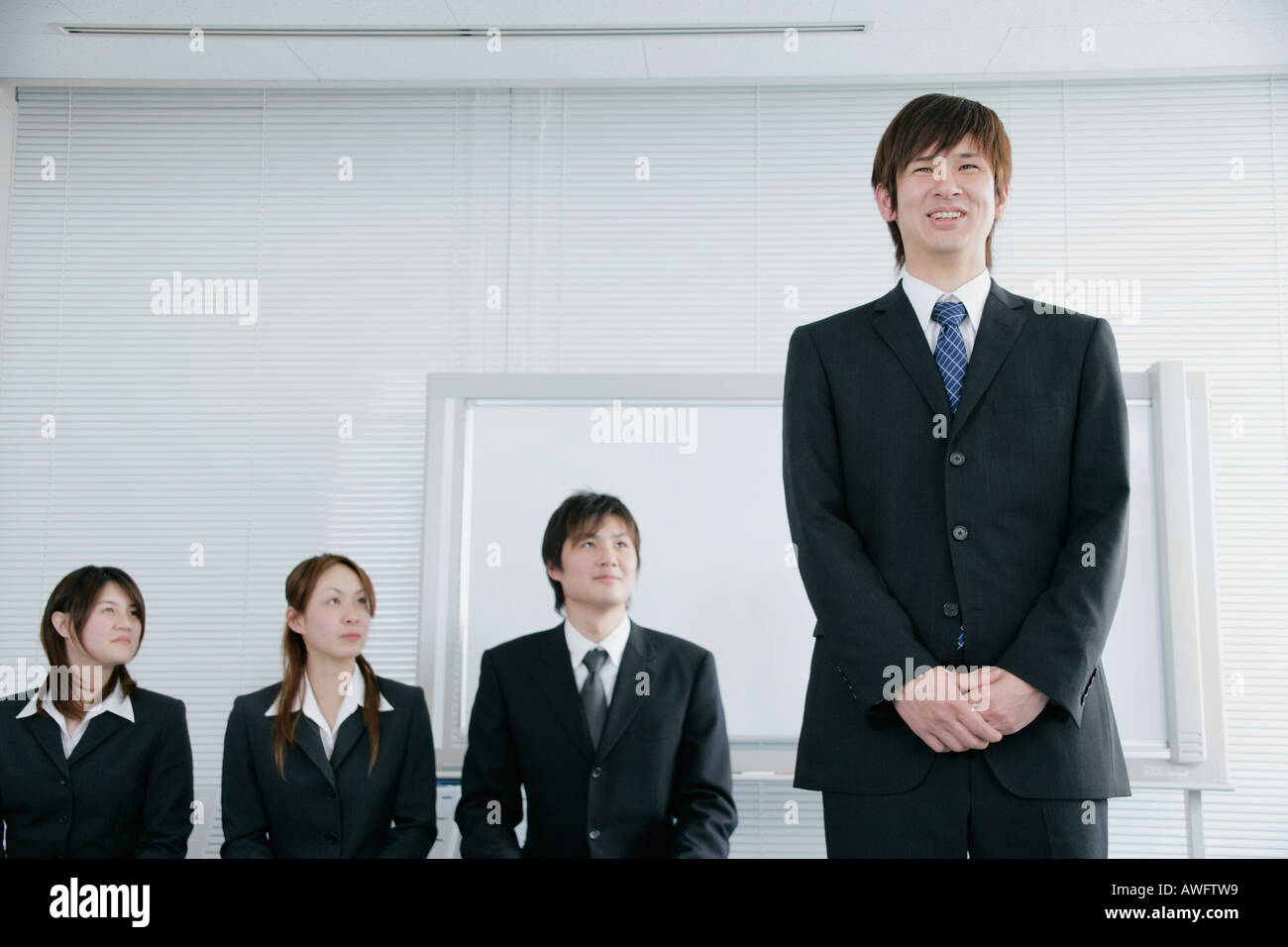 Four young people having job interview Stock Photo - Alamy