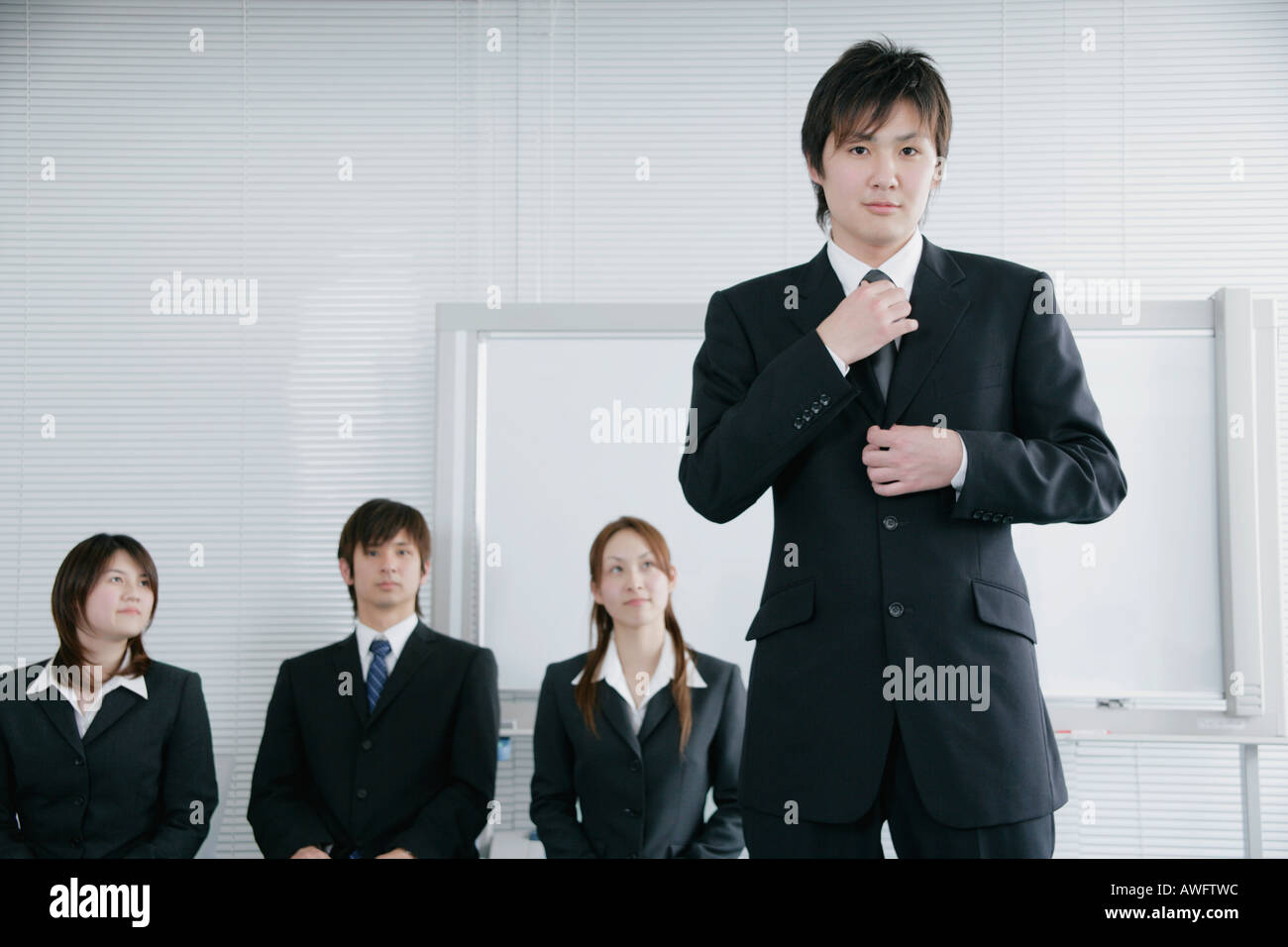 Four young people having job interview Stock Photo - Alamy