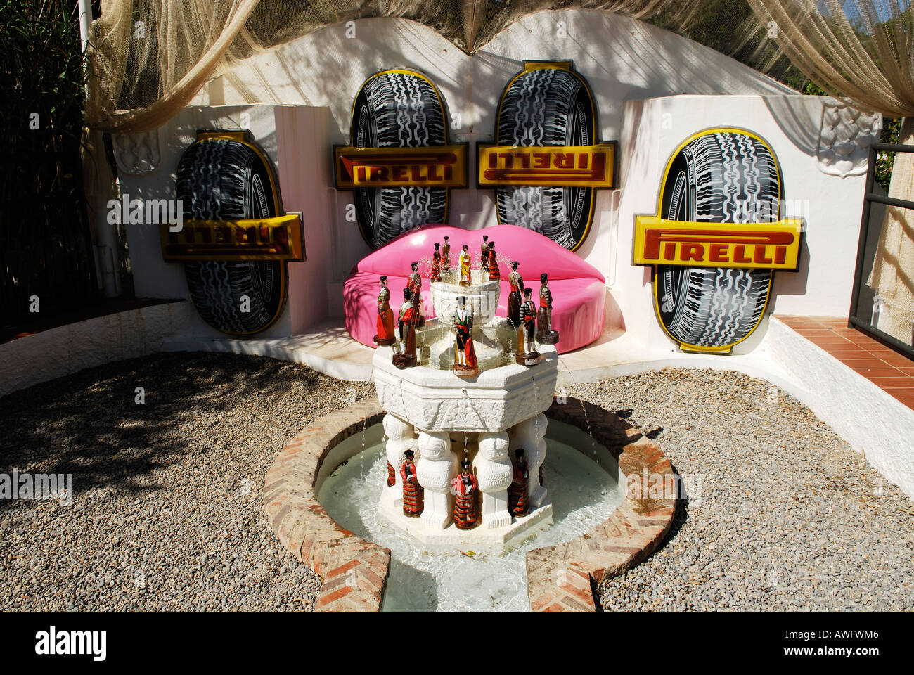 lip sofa, Pirelli advertising banner and liquor bottle fountain in the ...