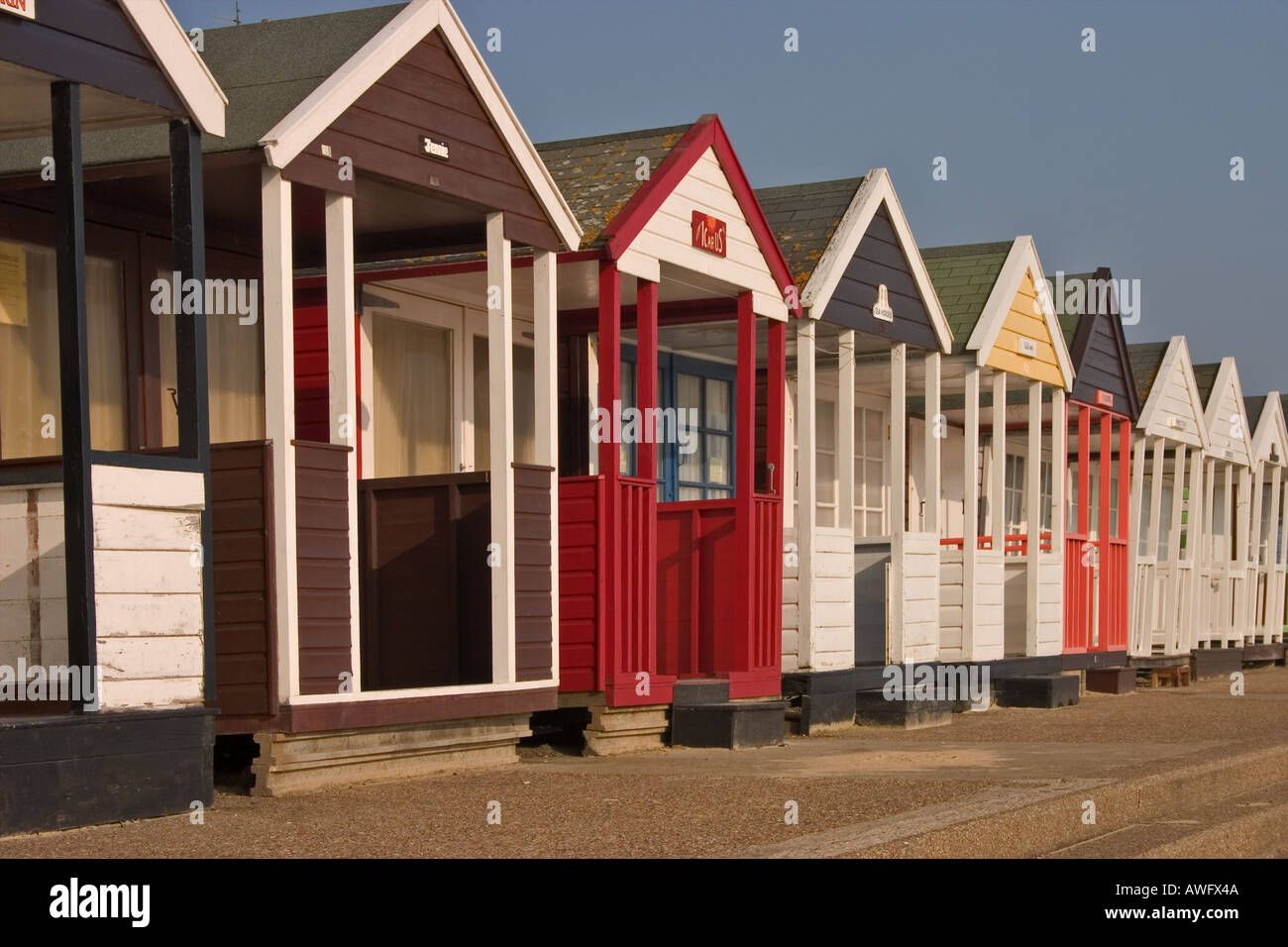 Line of Beach Huts Stock Photo - Alamy