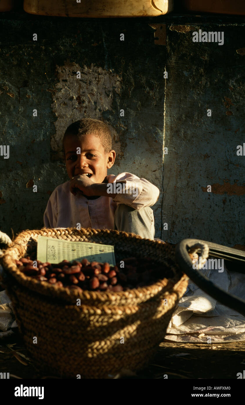 Boy selling dates in the Aswan market, Aswan, Egypt Stock Photo - Alamy