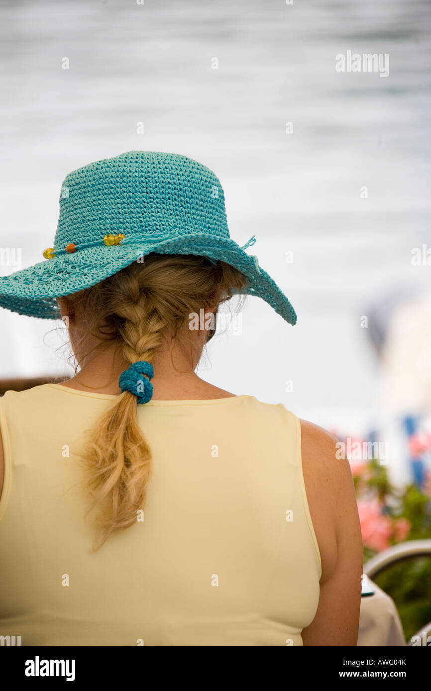 blonde woman with hat an plait Stock Photo - Alamy