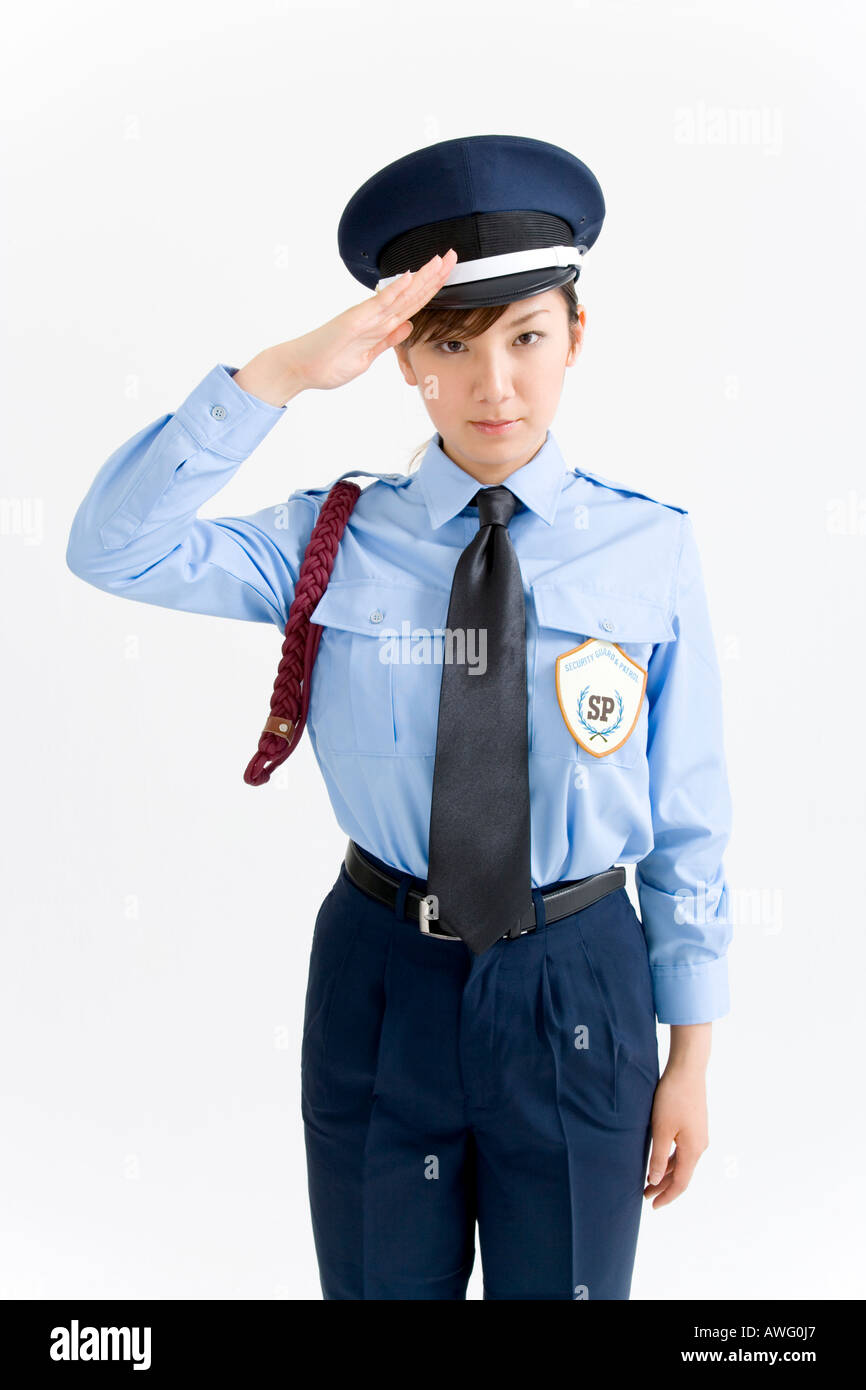 A female security guard saluting Stock Photo - Alamy