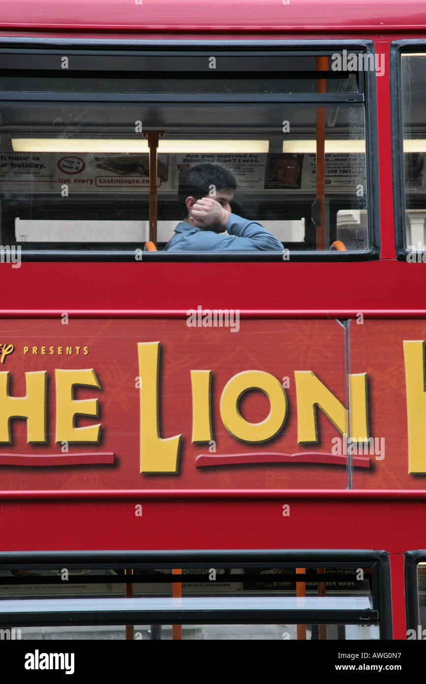 Bored passenger on London bus Stock Photo - Alamy