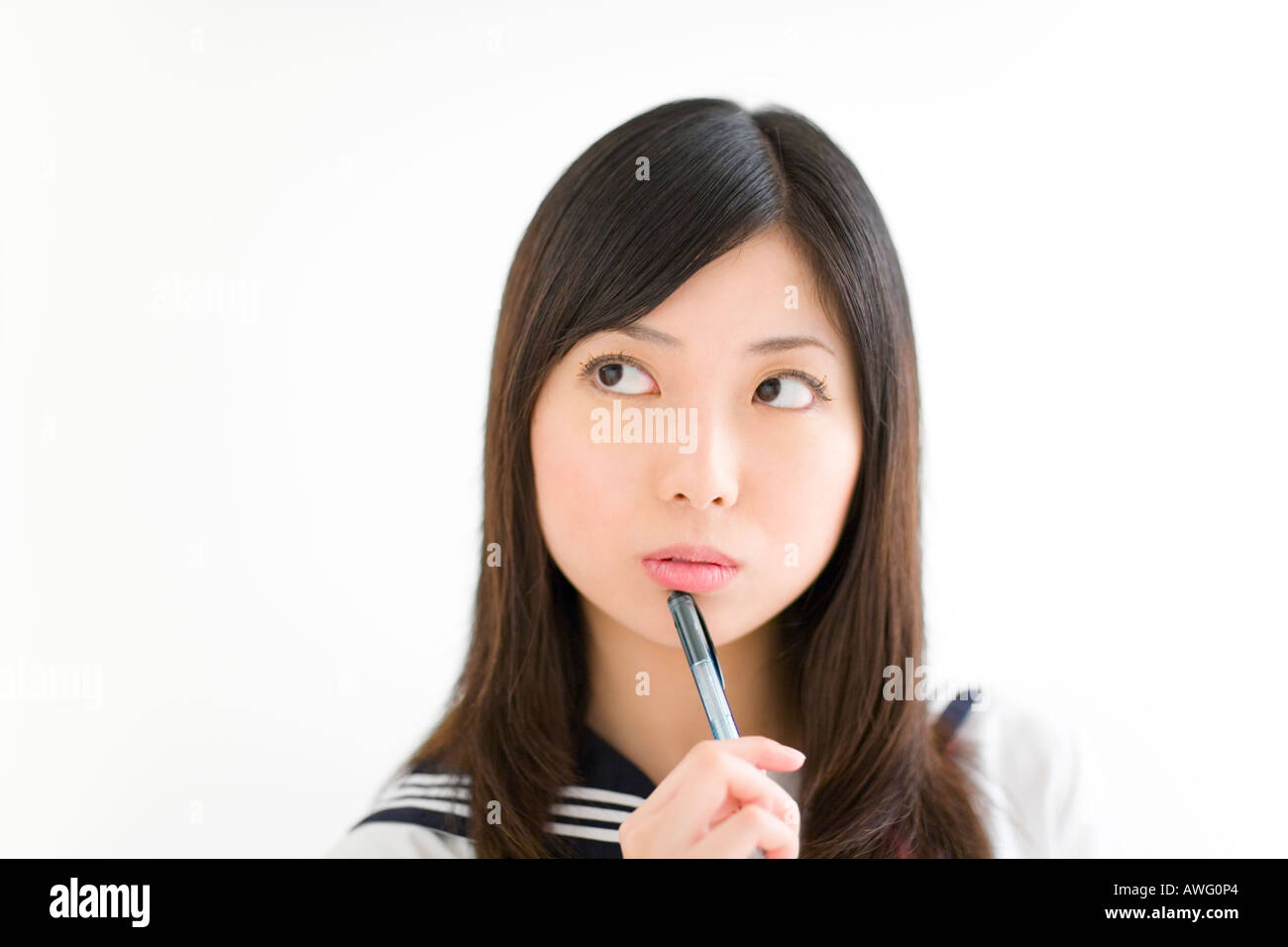 A high school girl thinking Stock Photo - Alamy