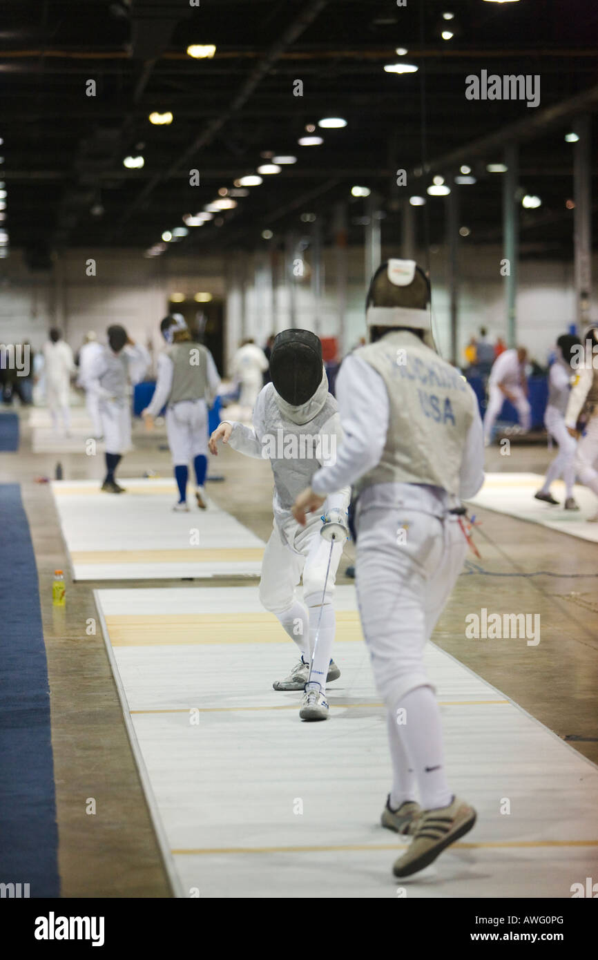 SPORTS Fencing competition bout male foil competitors on strip during ...