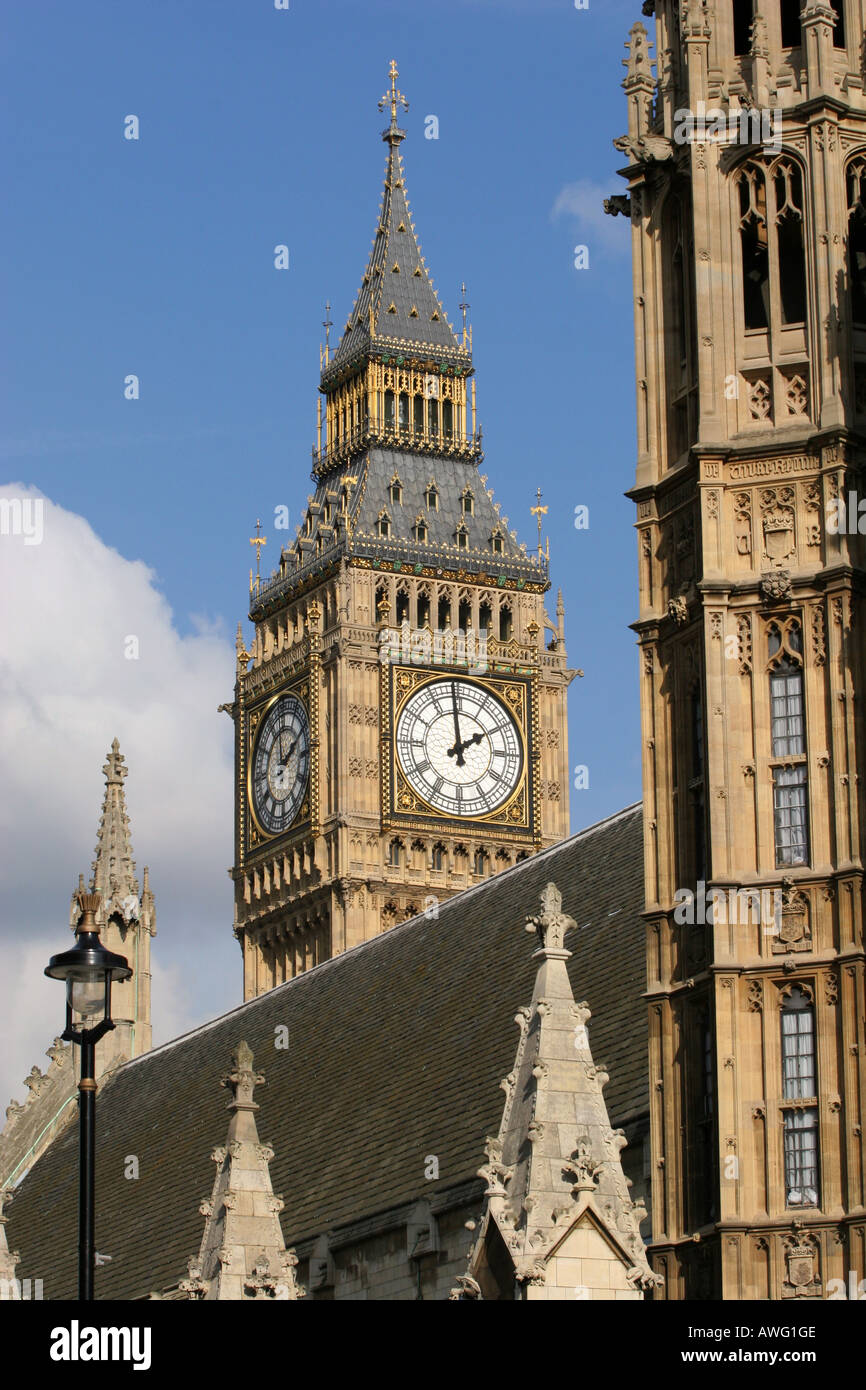 Unusual closeup view of Big Ben clock tower over the roof tops of the ...