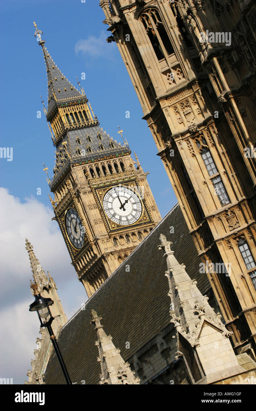 Unusual closeup view of Big Ben clock tower over the roof tops of the ...