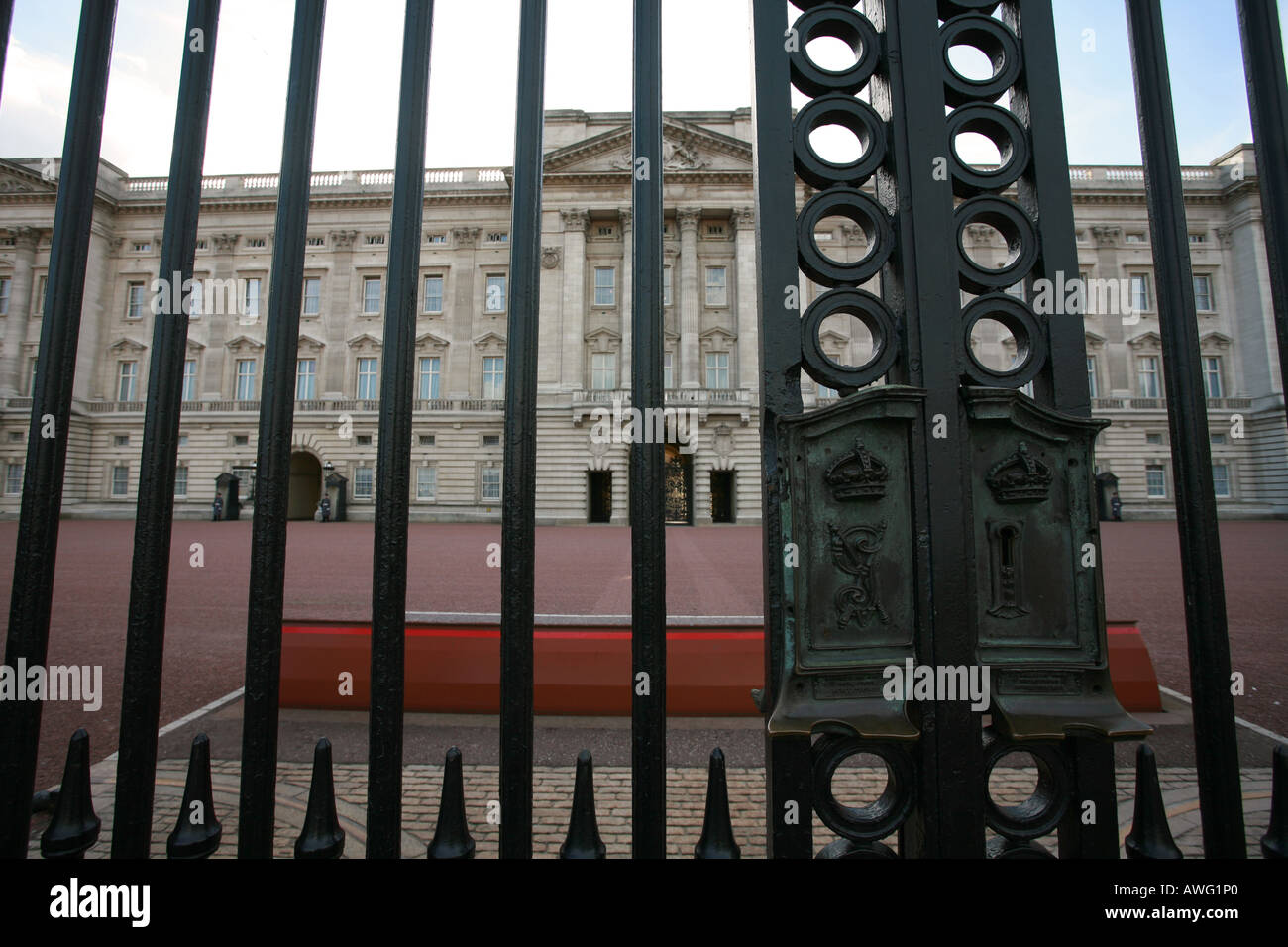Closeup of famous iron gates in front of royal Buckingham Palace at end ...
