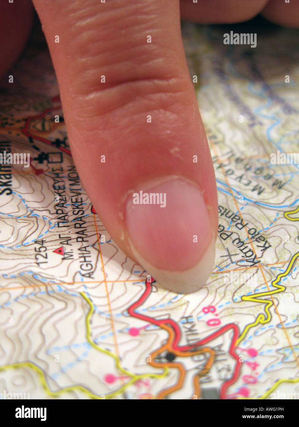 finger pointing the route on a map Stock Photo - Alamy