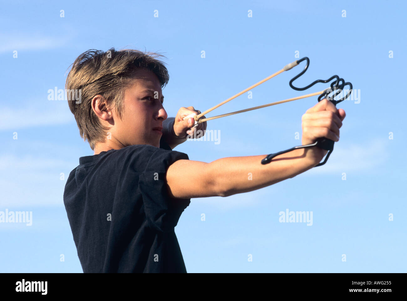 BOY WITH A SLINGSHOT Stock Photo - Alamy