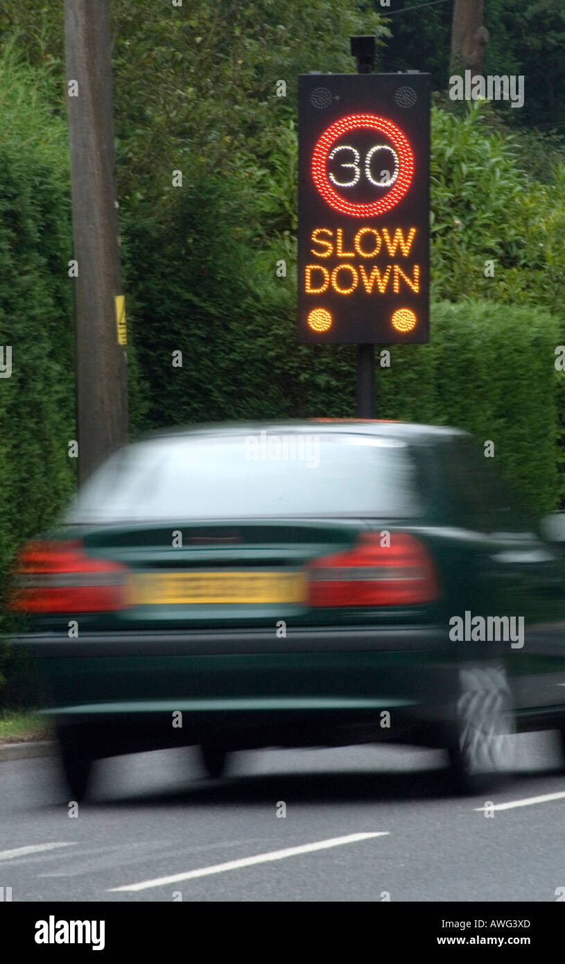 Car moving past 30 MPH illuminated speed limit reminder A2100 Battle ...